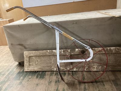 Lot 525 - Lambert Garden Hand Plow with Metal Wheel | Allens Auctions