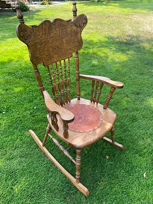 Lot 272 – Antique, press back rocking chair with leather seat inlay ...