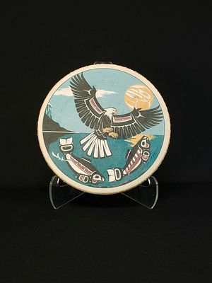Lot 14 – Haida Hand drum. Screened design hand drum with eagle and fish. Signed by Clarence A ...