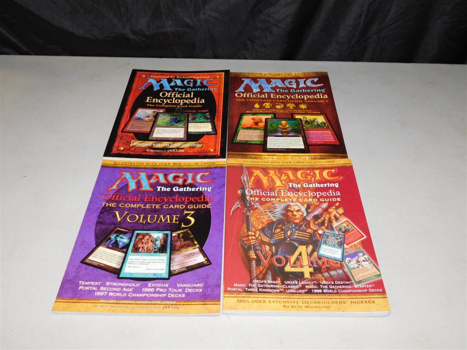 Lot 235 - MTG Encyclopedia Lot - Volume 1-4 - Bodnar's Auction ...