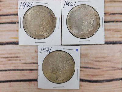 Lot 242 - 3 1921 P Morgan Silver Dollars - Bodnar's Auction ...