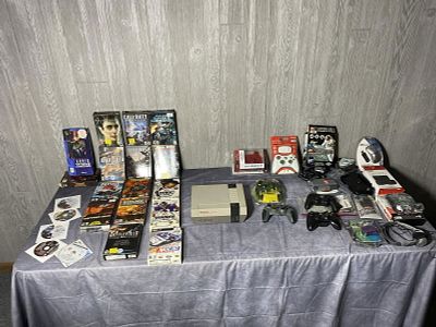 Lot 740 - Nintendo System, Games, PSP Controllers and More | Burns ...