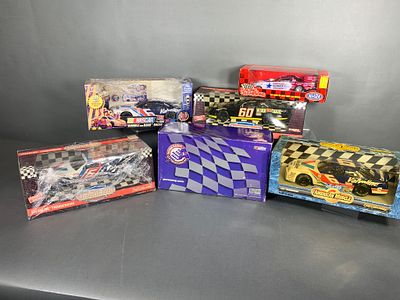 Lot 8105 - Six Vintage Diecast Race Cars by Ertl and Action Motorsports ...