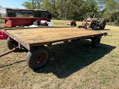 Lot 111 - Vintage Heavy-Duty Flatbed Farm Hay Wagon with Wooden Deck ...