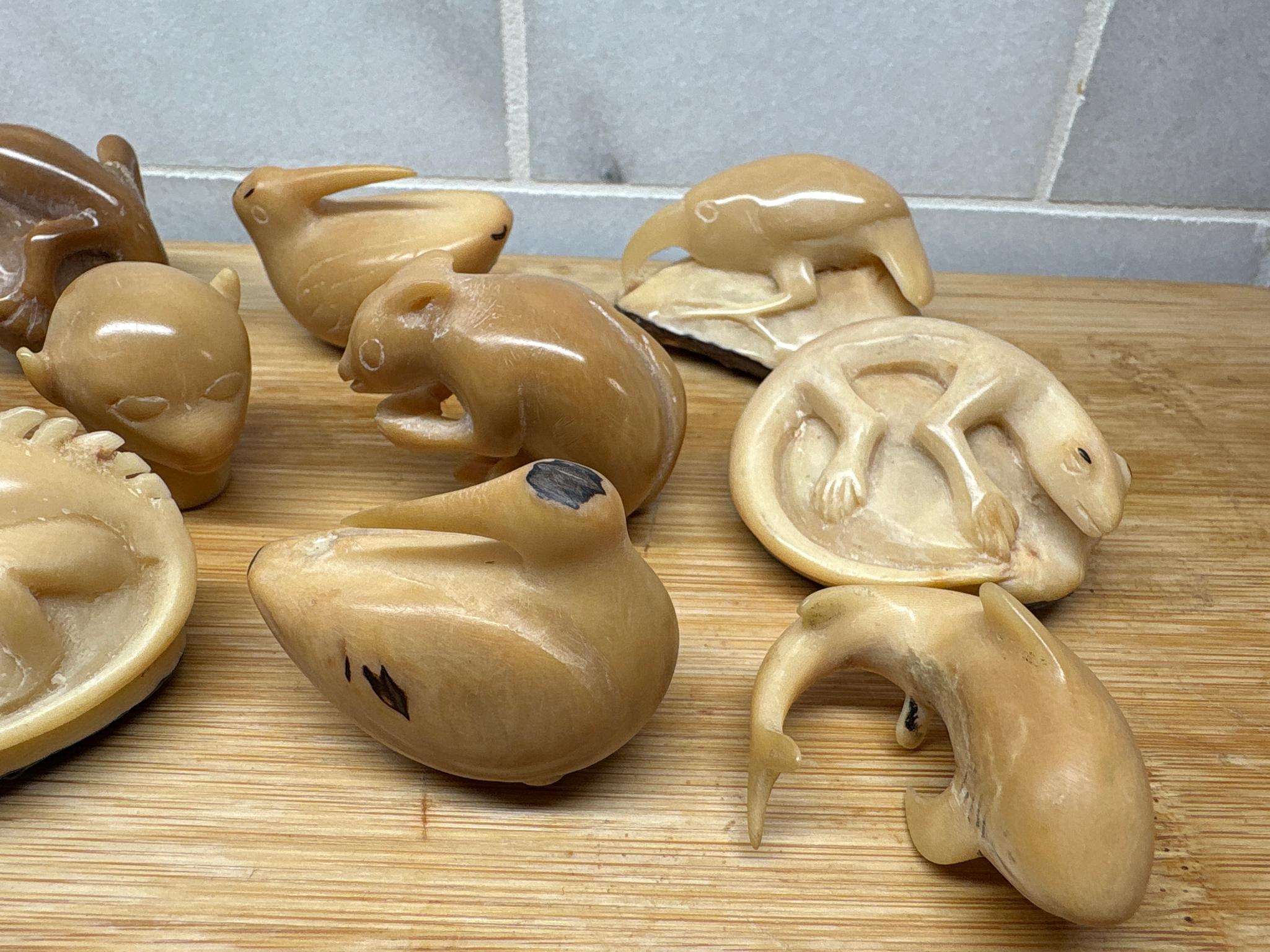 Lot 5434 - A Collection of Japanese Carved Tagua Nut okimono Figures ...