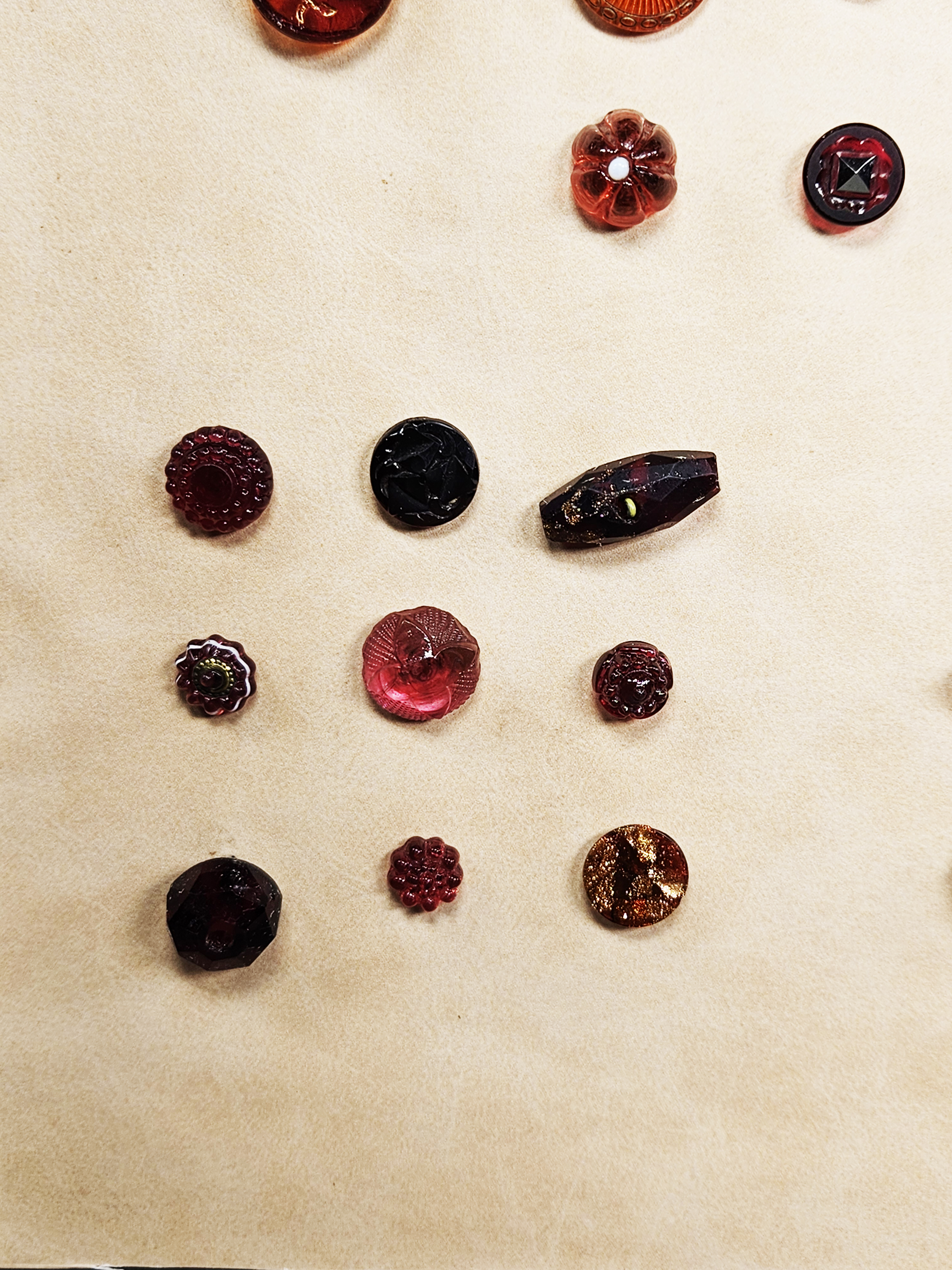 Lot 2177 - A Collection of Division I Ruby and Cranberry Glass Buttons ...
