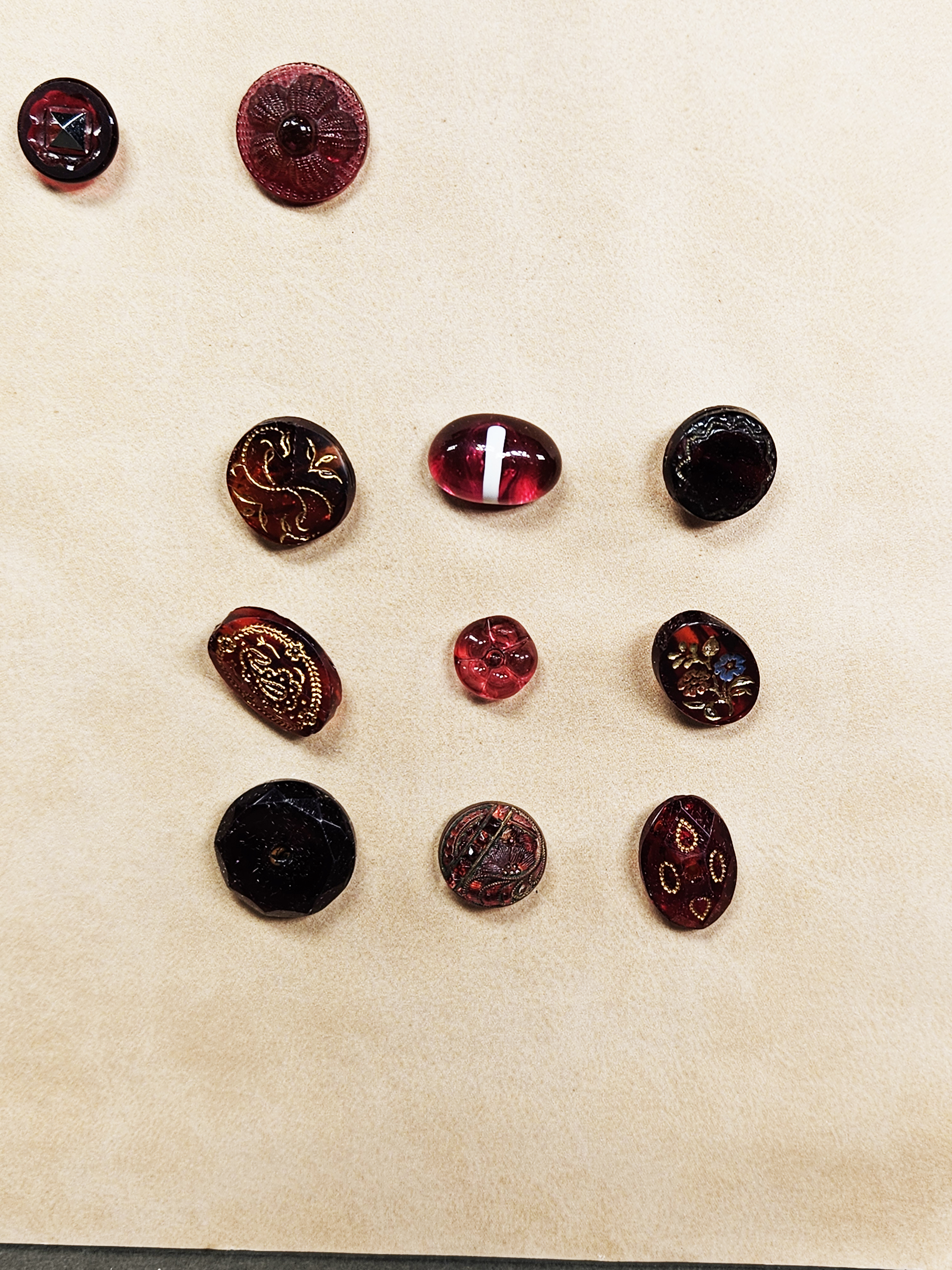 Lot 2177 - A Collection of Division I Ruby and Cranberry Glass Buttons ...