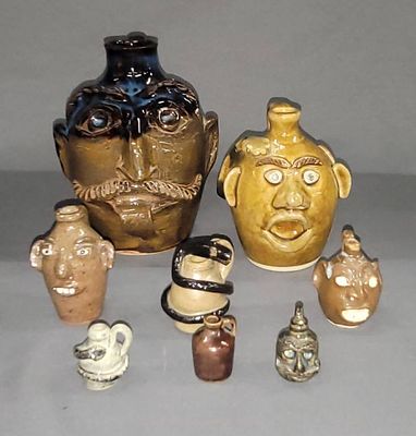 Lot 92 - Fine Mini Face Jug Lot of 8 Jugs | Cagle Auction Company