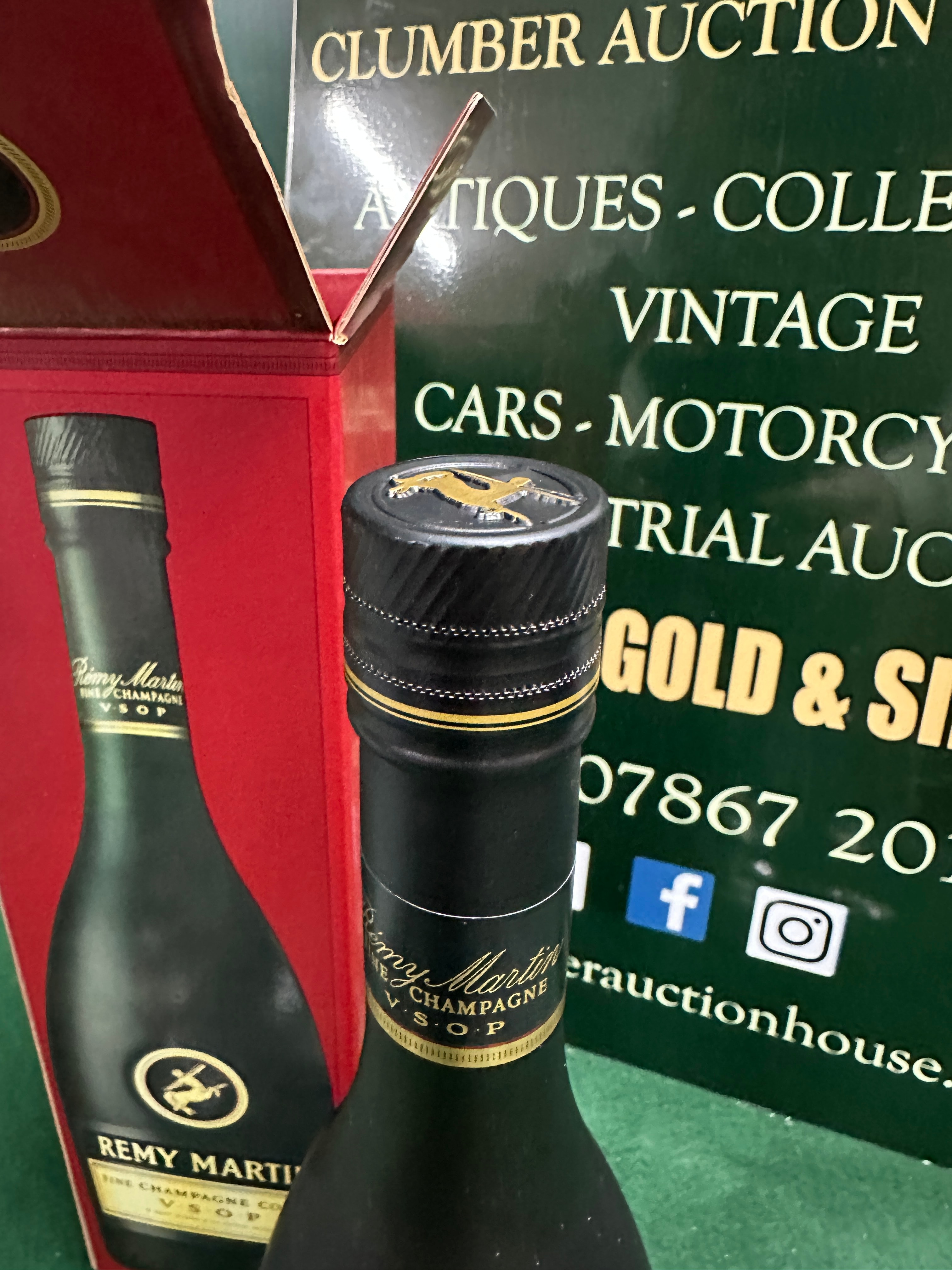 Lot 87 – one Bottles of Remy Martin VSOP Fine Champagne Cognac and a Set of Six Branded Snifter ...