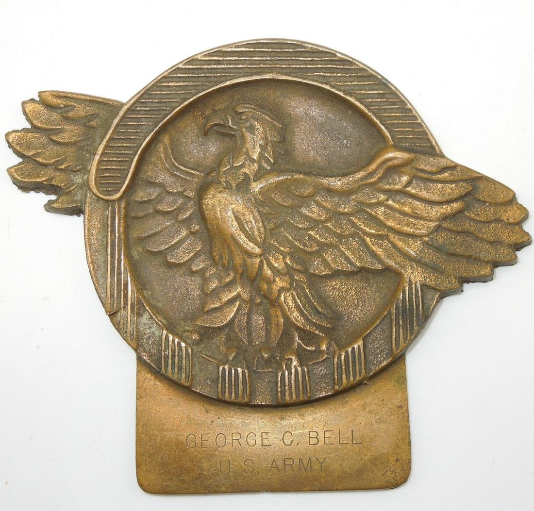 Lot 395 - WWII Named Ruptured Duck Brass Military Plaque | CNY Militaria