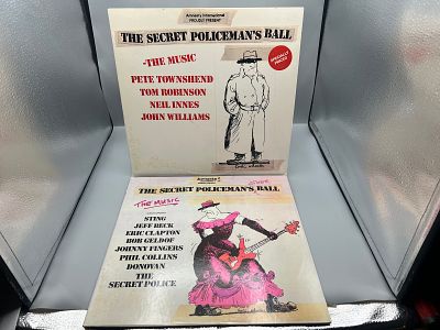 Lot 61a - Two (2) LP Lot: The Secret Policeman's Ball (1980) and The ...