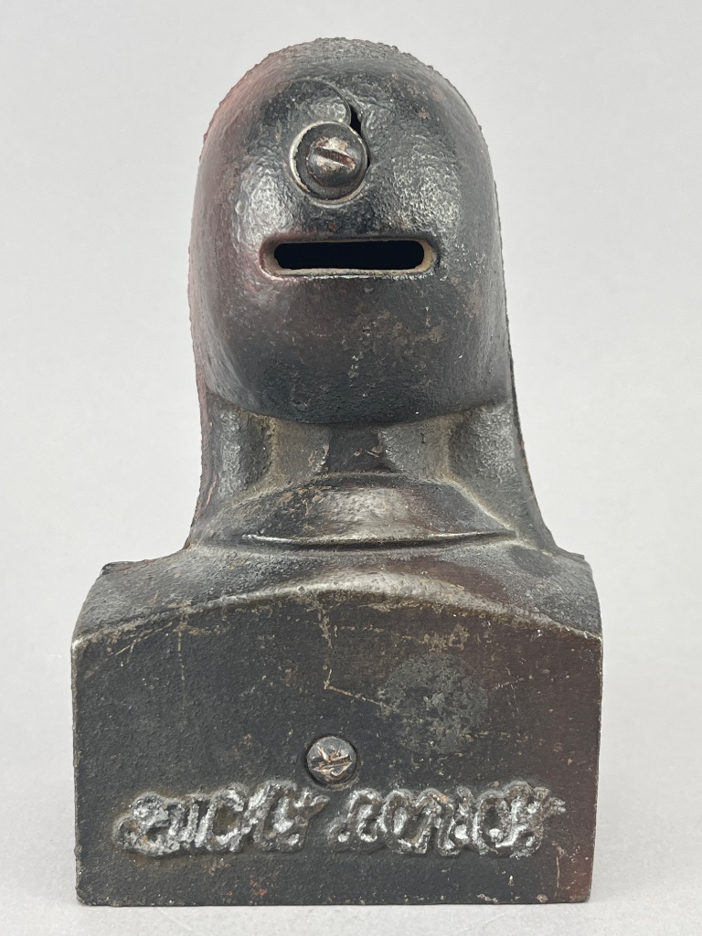 Lot 324 – Vintage Cast Iron Aviator Coin Bank | Epic Auctions & Estate ...