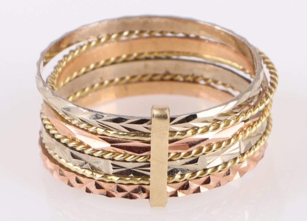 Lot 177060 – 10K GOLD SEVEN-LAYERED LADIES RING – Florida Estate Sales ...