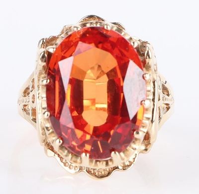 Lot 202151 - 12.70CT OVAL ORANGE SAPPHIRE 10K GOLD RING | Florida ...