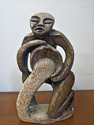 Lot 6 - Shona Stone Figure Pouring. - Grand Oak Auctions