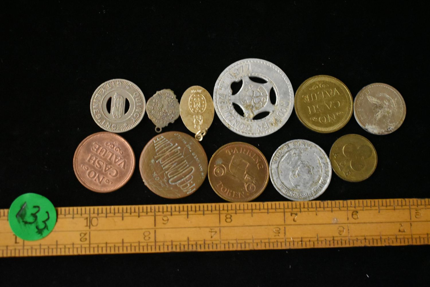 Lot 133 - Lot of 11 Advertisement Tokens | Heartland Artifact Auctions