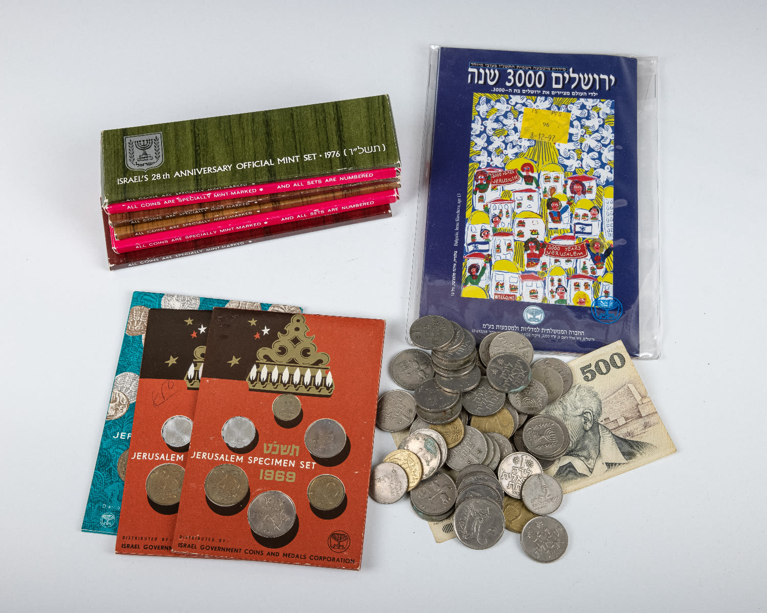 Lot 212 – A LARGE BAG OF ISRAELI COINS AND SETS | J Greenstein