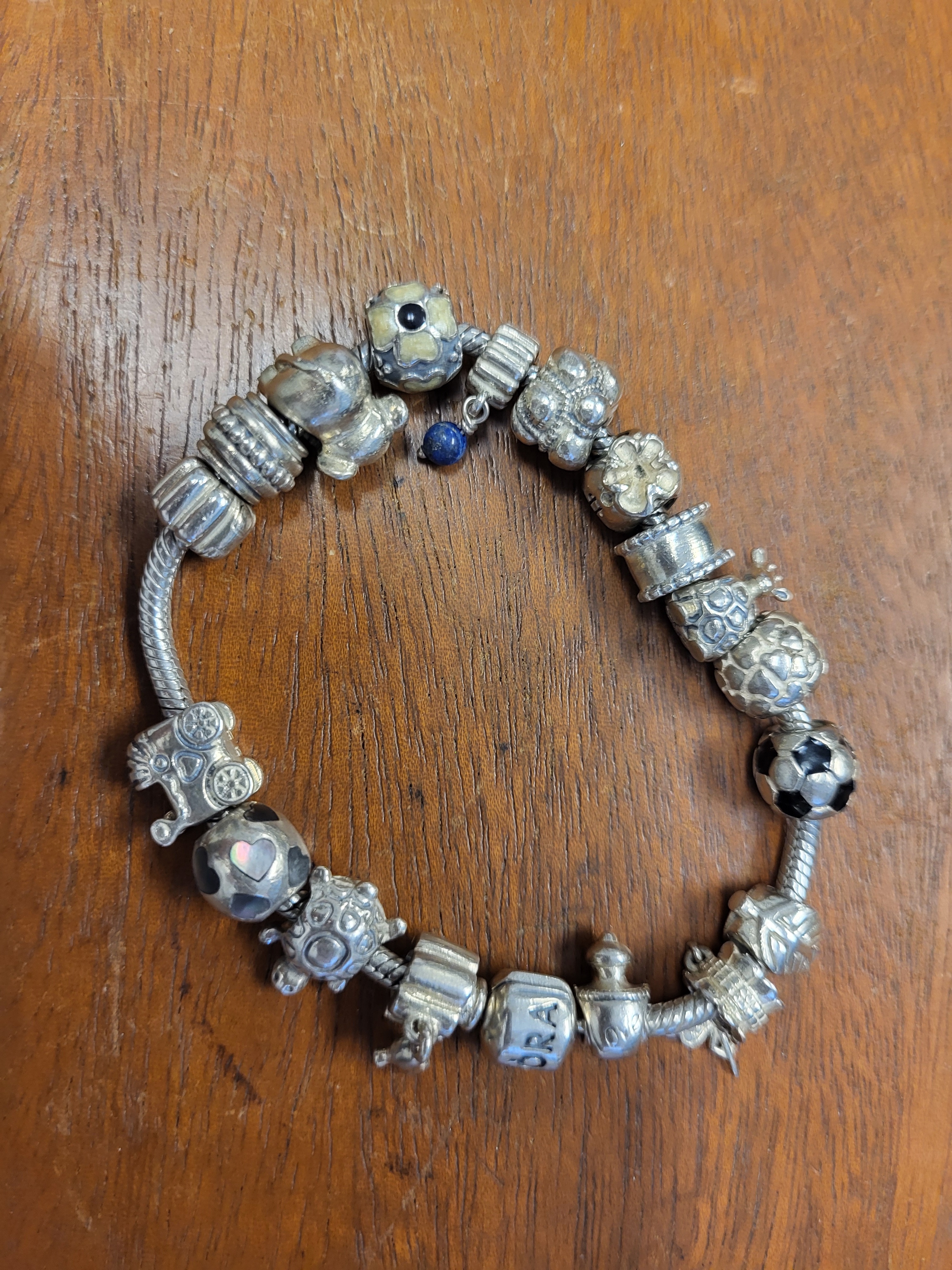 Lot 90 – Sterling Charm Bracelet w/18 charms Pandora – A. Kleins ...
