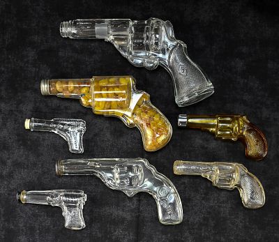Lot 25 - COLLECTION OF GLASS CANDY GUN CONTAINERS | McLaren Auction ...