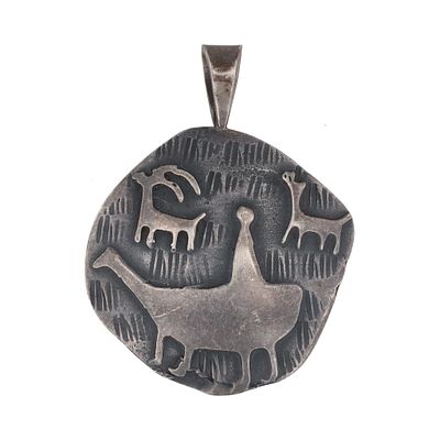 Lot 94 - Signed Hopi Sterling Overlay Animal Pendant | Retro Roadshow
