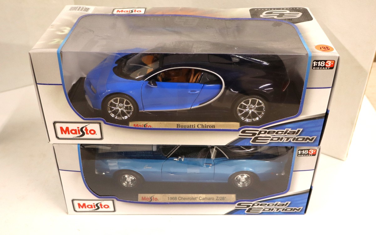 Lot 188 - 2 Maisto diecast cars 1/18 scale in original packaging ...