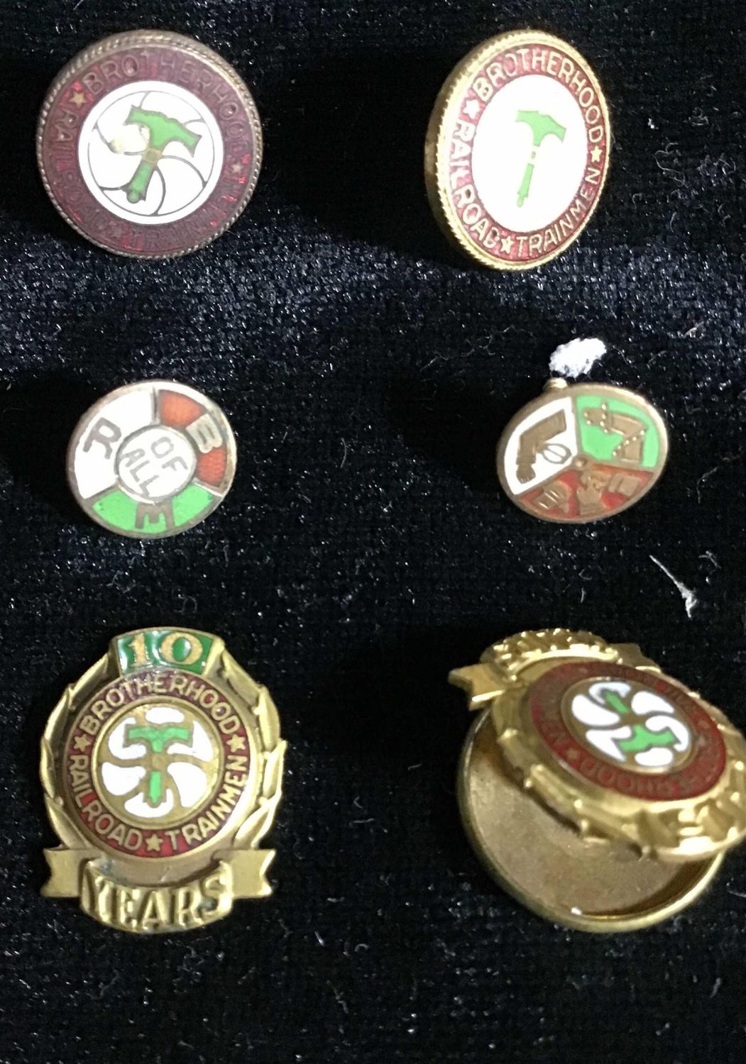 Lot 35 - Brotherhood railroad trainman pins . | The Lodge Auction House