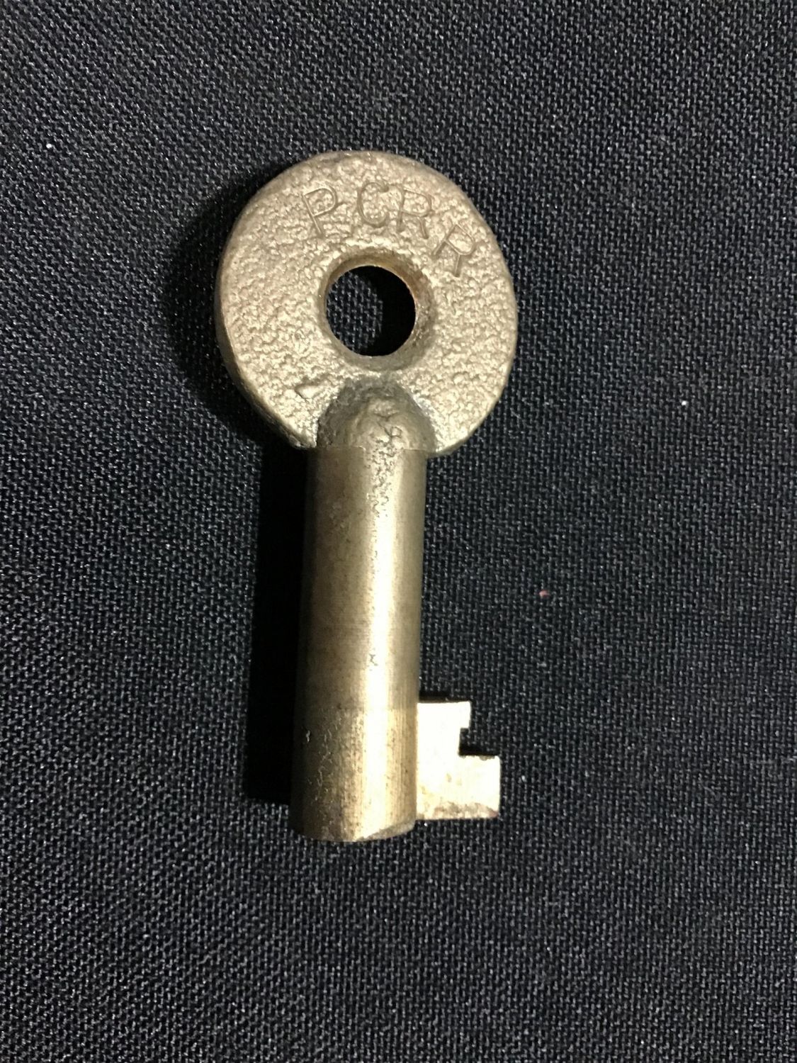 Lot 200 - Pacific Central Railroad key . | The Lodge Auction House
