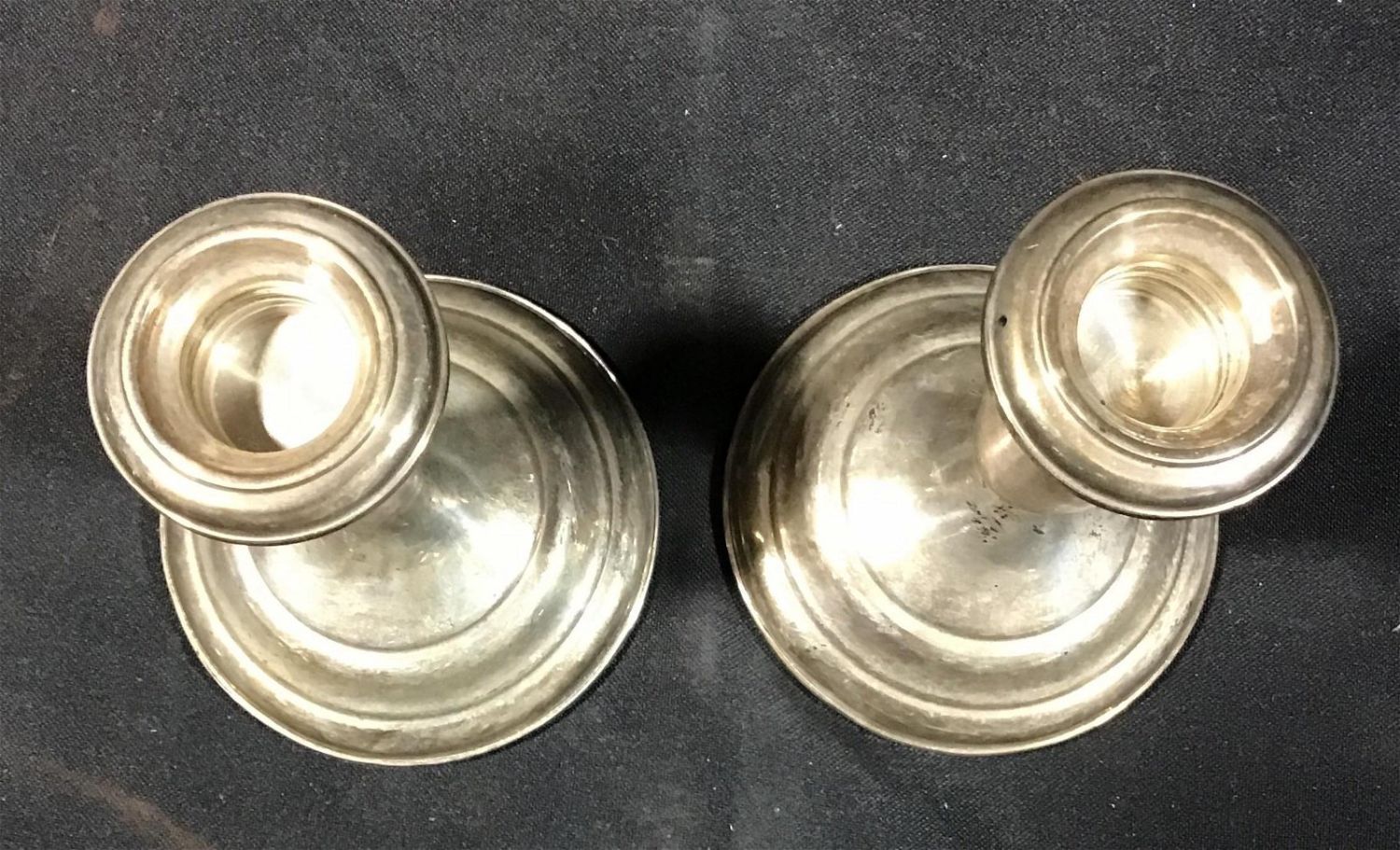 Lot 219 - Two Sterling candlestick holders | The Lodge Auction House