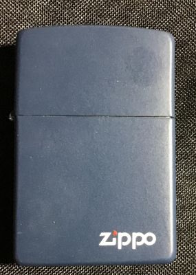 Lot 129 - 1995 Blue Coated Zippo w/ Zippo Decal | The Lodge Auction House