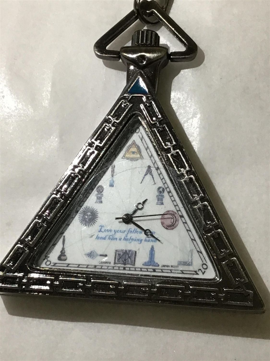 Lot 124 - Vintage Quartz Triangle Pocket Watch | The Lodge Auction House