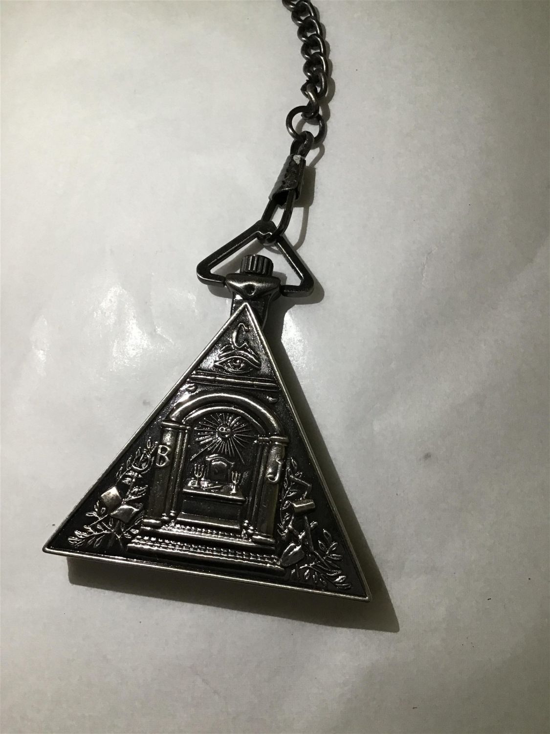 Lot 124 - Vintage Quartz Triangle Pocket Watch | The Lodge Auction House