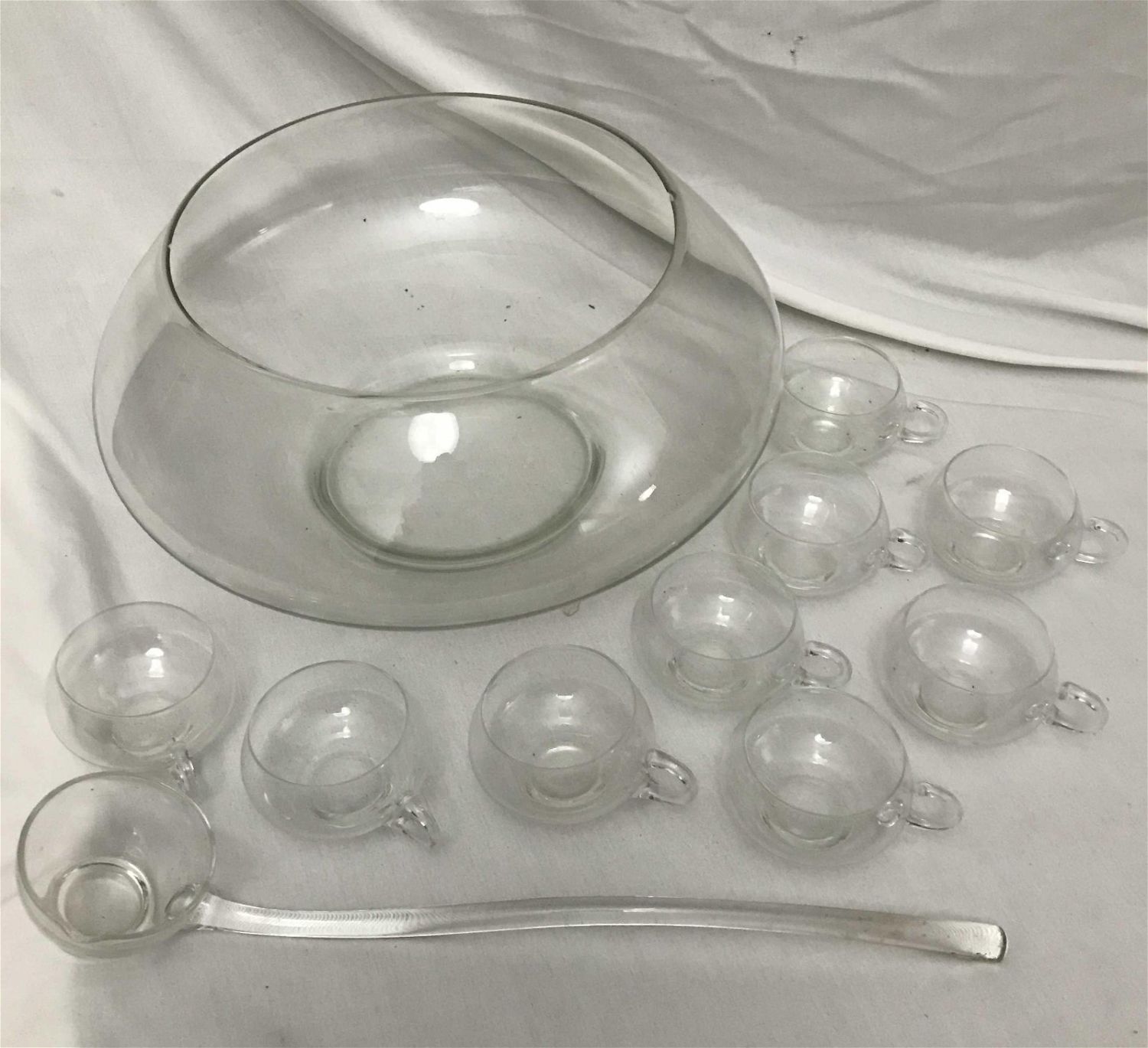 Lot 44 - Glass Punch Bowl Set with one long handled ladle and 9 punch ...