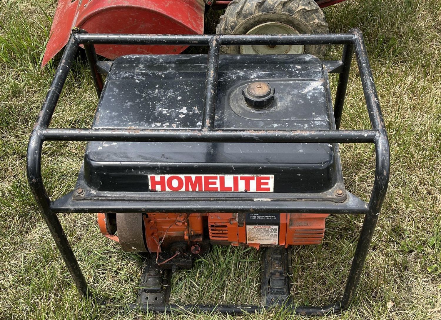Lot 14 - Homelite Cast Iron 4400 W Generator | The Lodge Auction House