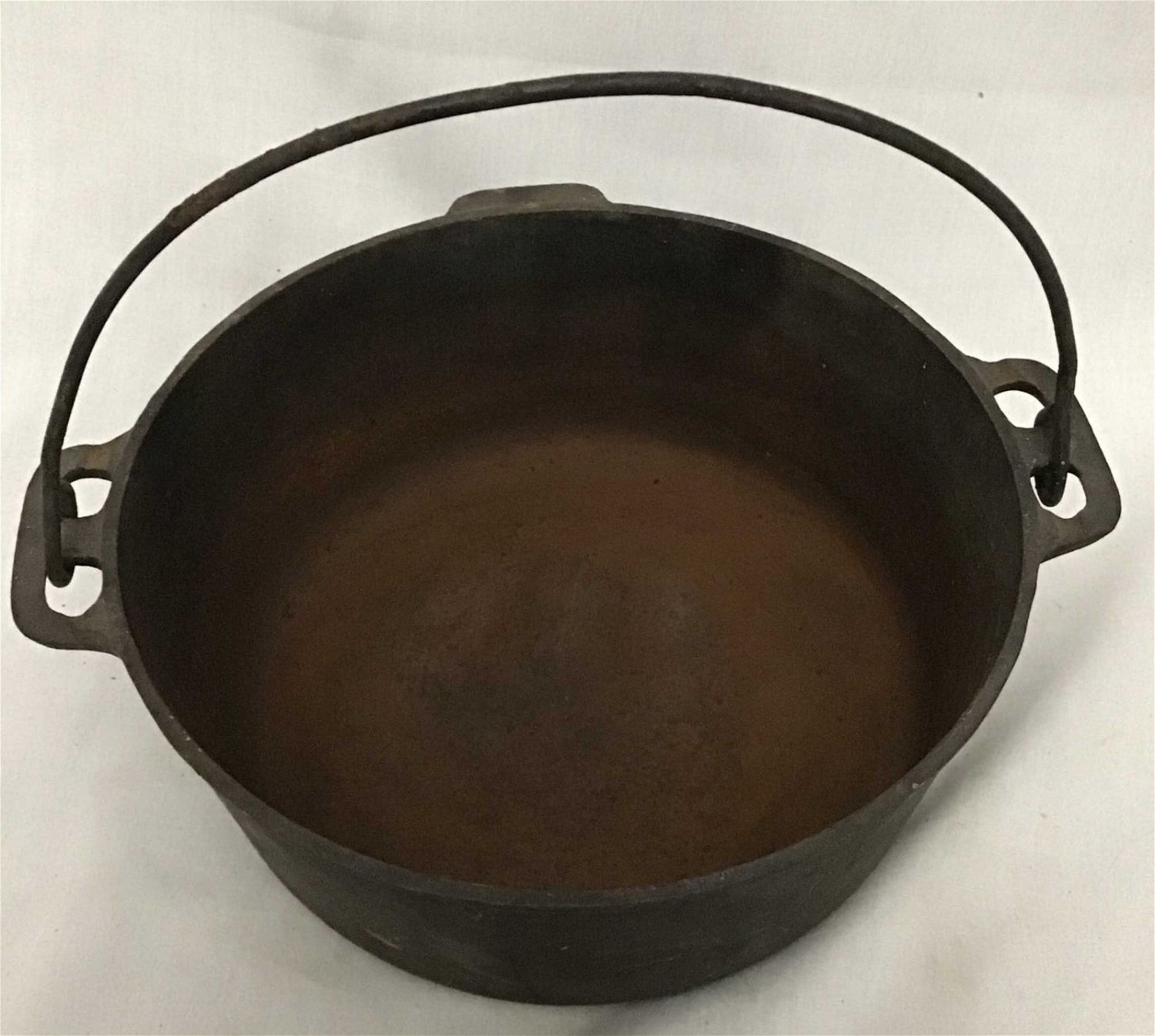Lot 56 - Vintage Cast-Iron Dutch Oven | The Lodge Auction House