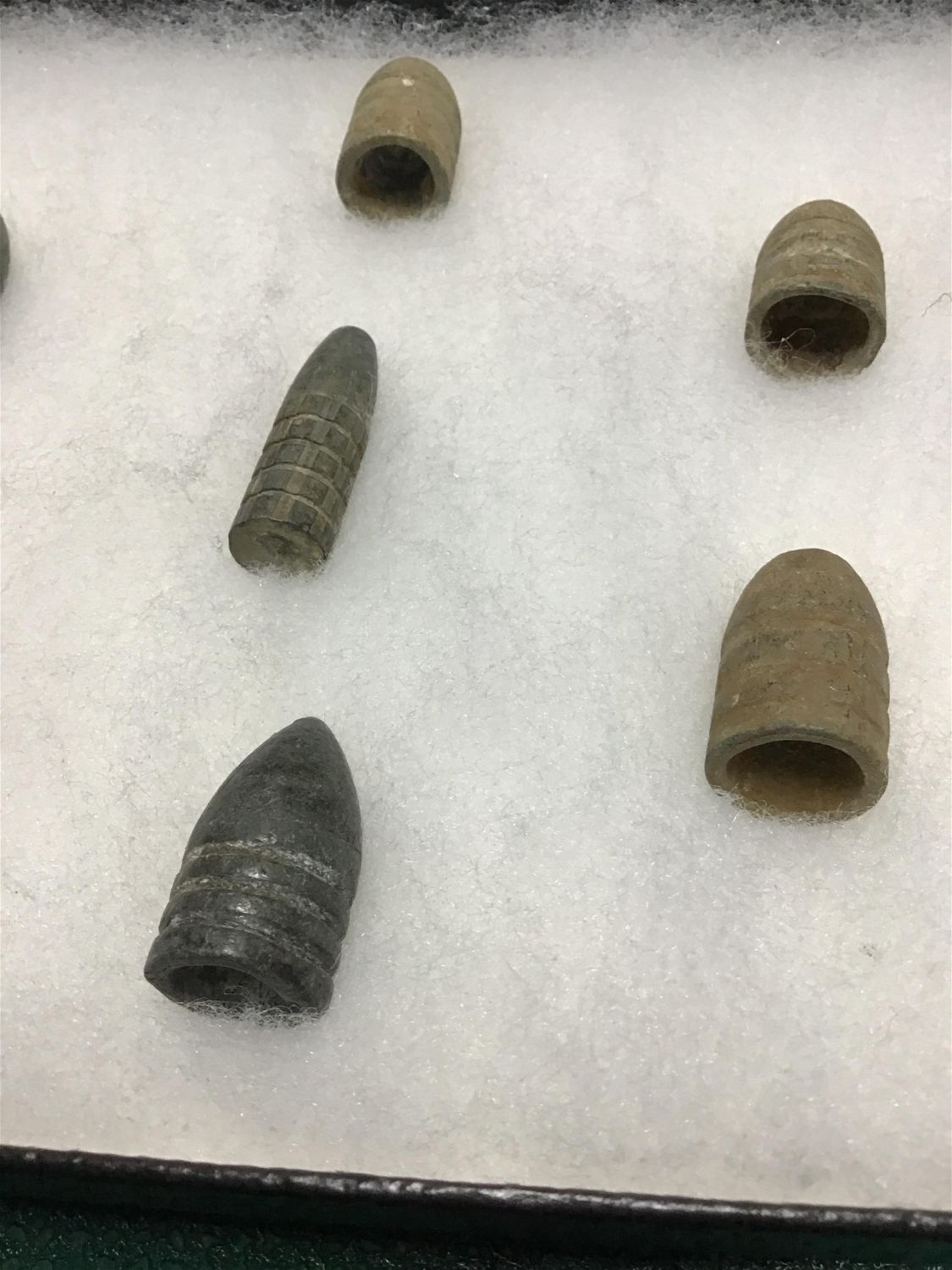 Lot 40 - Early Bullet Casings (7) | The Lodge Auction House