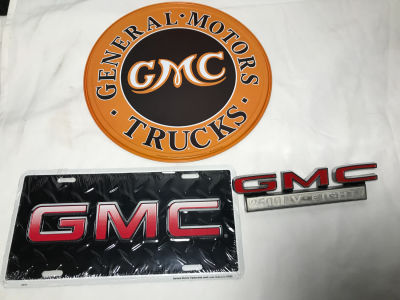 Lot 212 - GMC Advertising - Tin sign, license plate & car | The Lodge ...