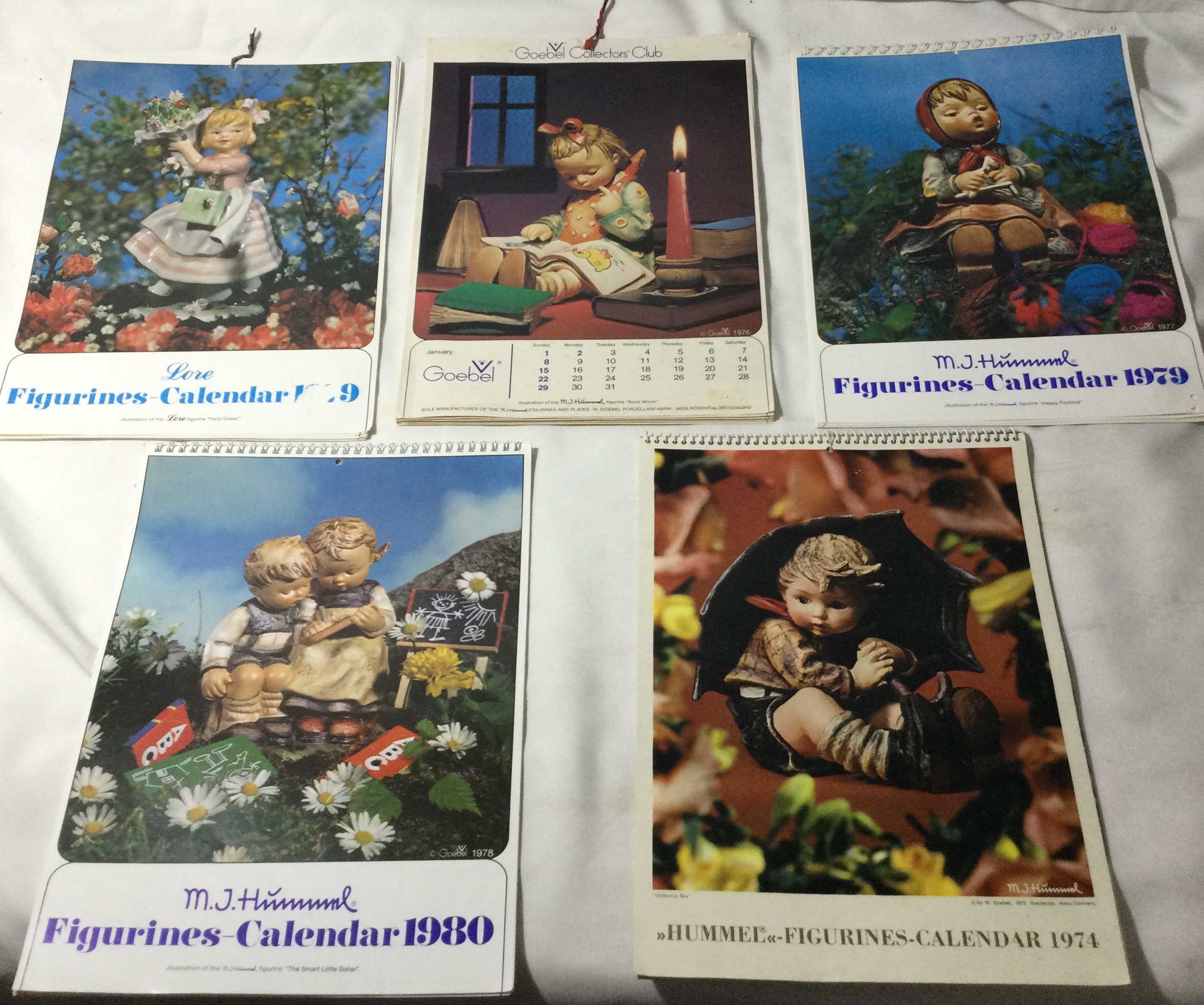 Lot 143 - Hummel Calendars years with pictures | The Lodge Auction House