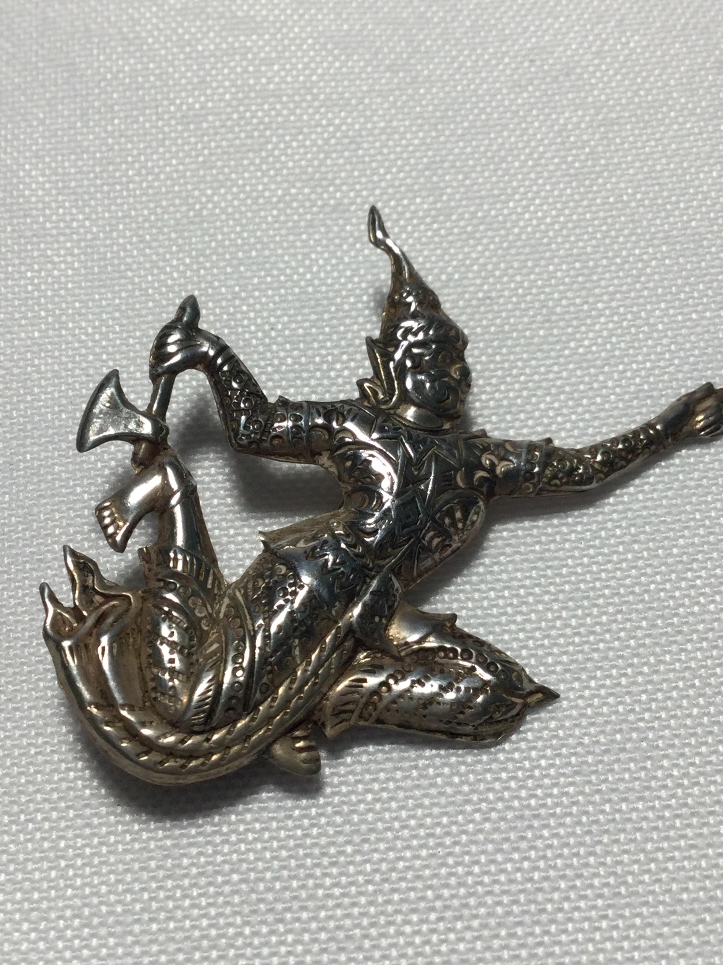 Lot 1 - Siam Sterling Thunder God Brooch | The Lodge Auction House