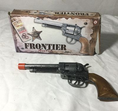 Lot 285 - Frontier Toy Six Shooter Pistol | The Lodge Auction House