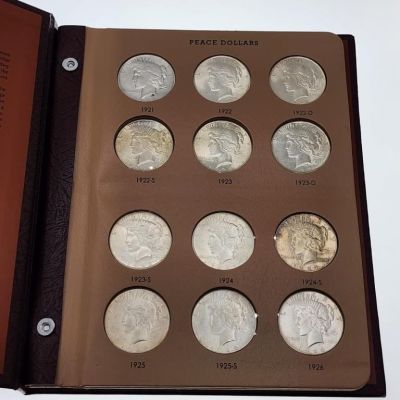 Lot 717 - Complete Set US Peace Dollars, 1921-1935 • Wickliff Auctioneers