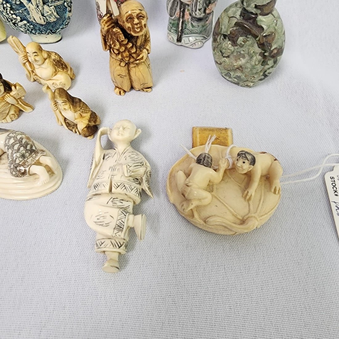 Lot 714 - Oriental Figural Carvings • Wickliff Auctioneers